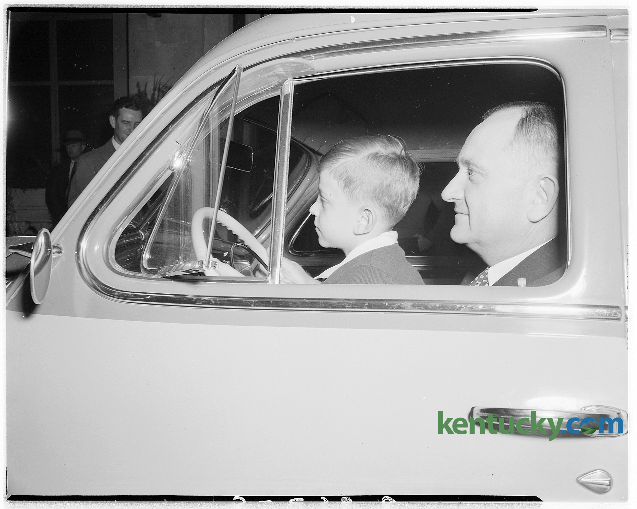 Adolph Rupp and son, 1946 | Kentucky Photo Archive